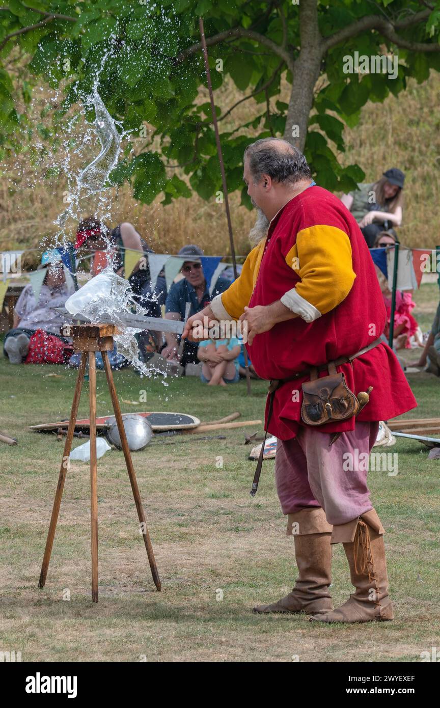 Enactors from the Bowlore troupe in medieval period costume at their ...