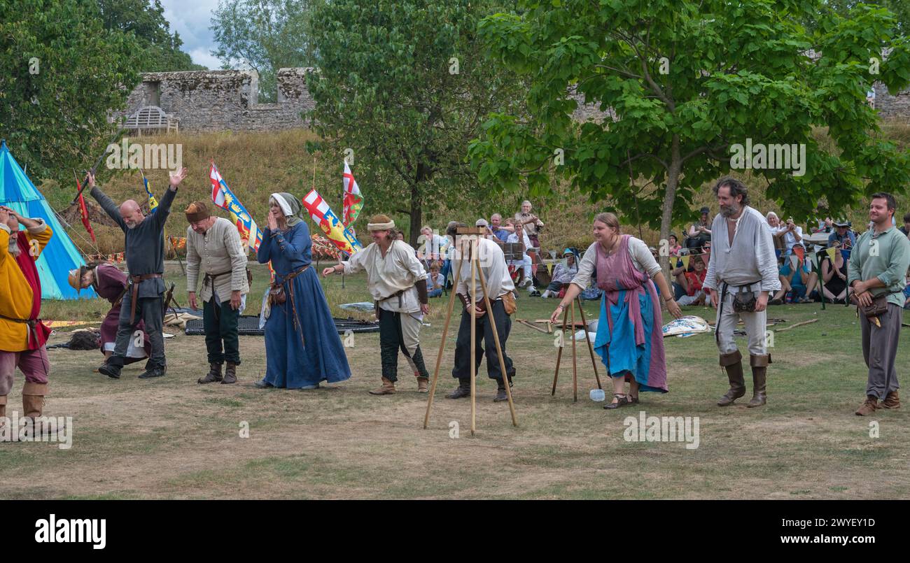 Enactors from the Bowlore troupe in medieval period costume at their ...
