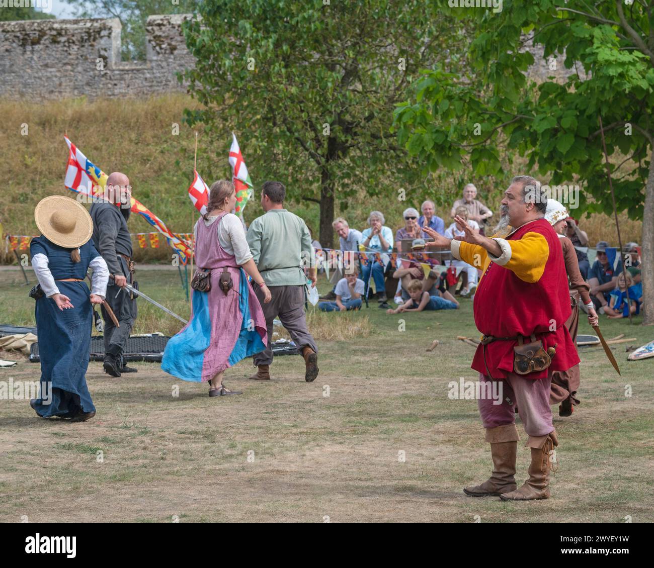 Enactors from the Bowlore troupe in medieval period costume at their ...
