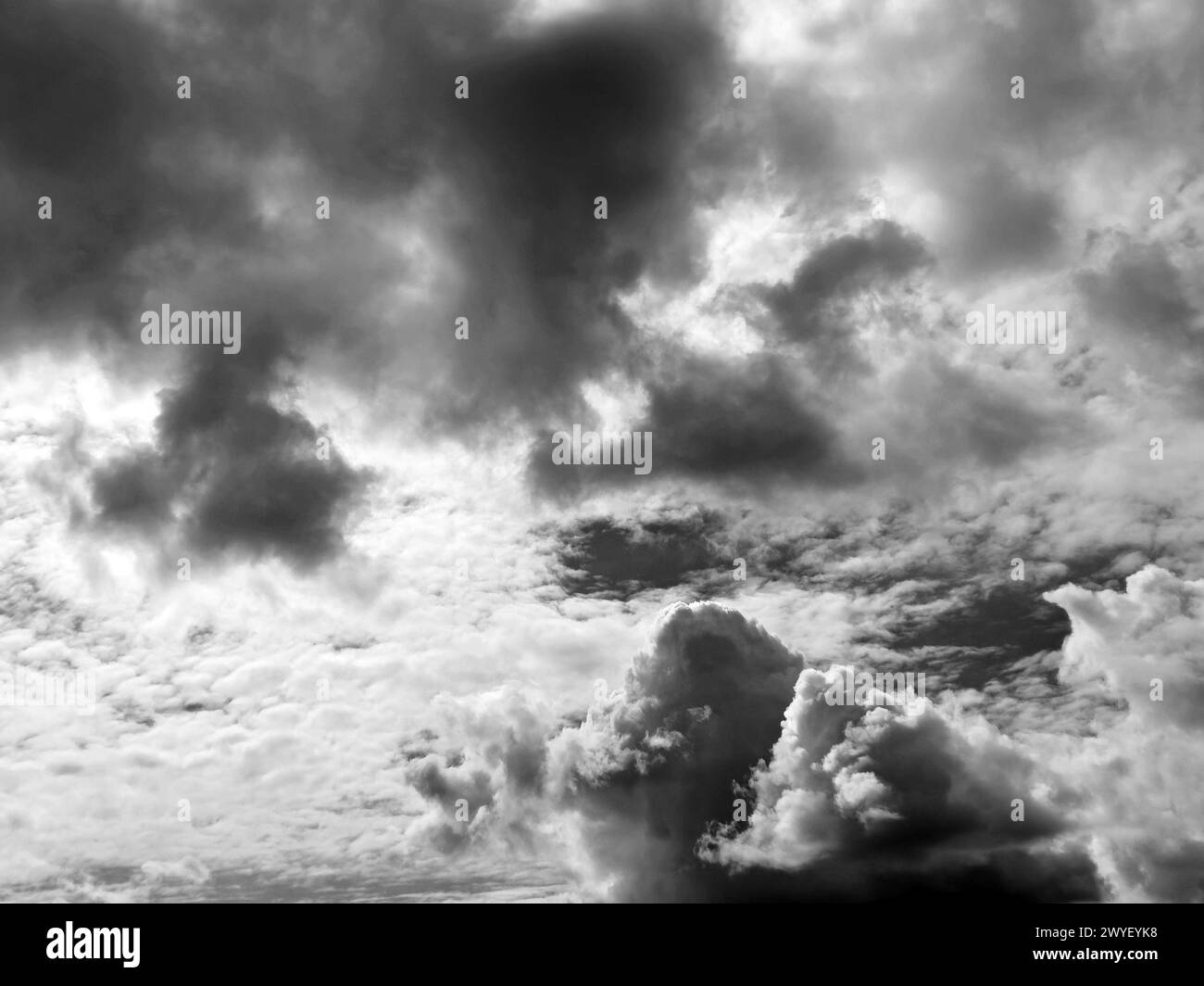 Black and white clouds in the sky background Stock Photo - Alamy
