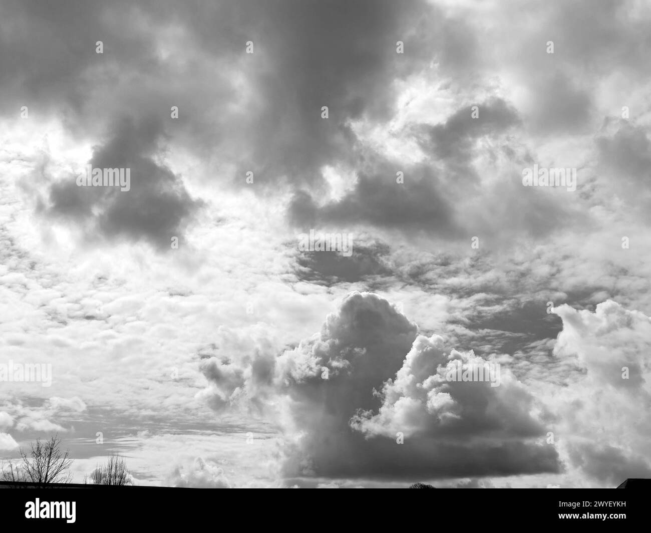 Black and white clouds in the sky background Stock Photo - Alamy
