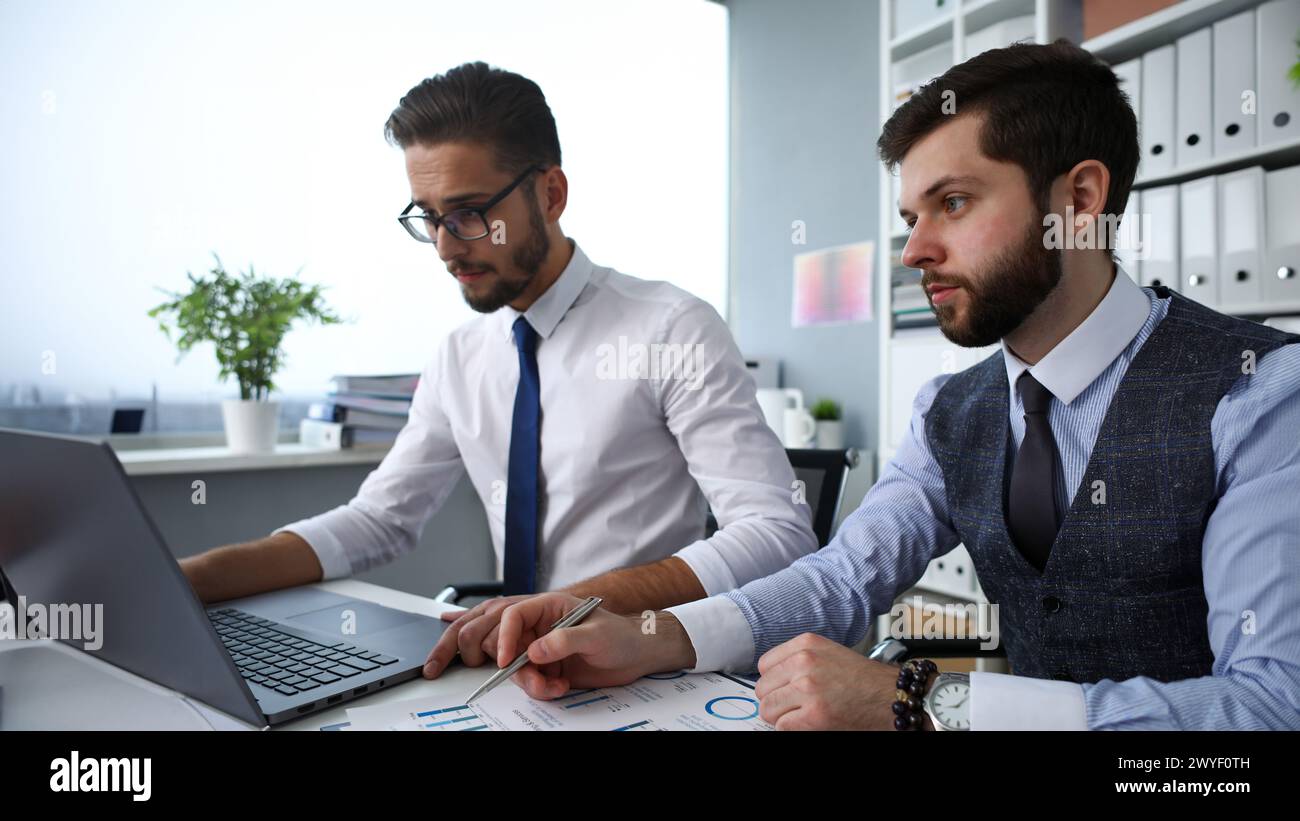 Group of people in office use laptop pc portrait Stock Photo - Alamy