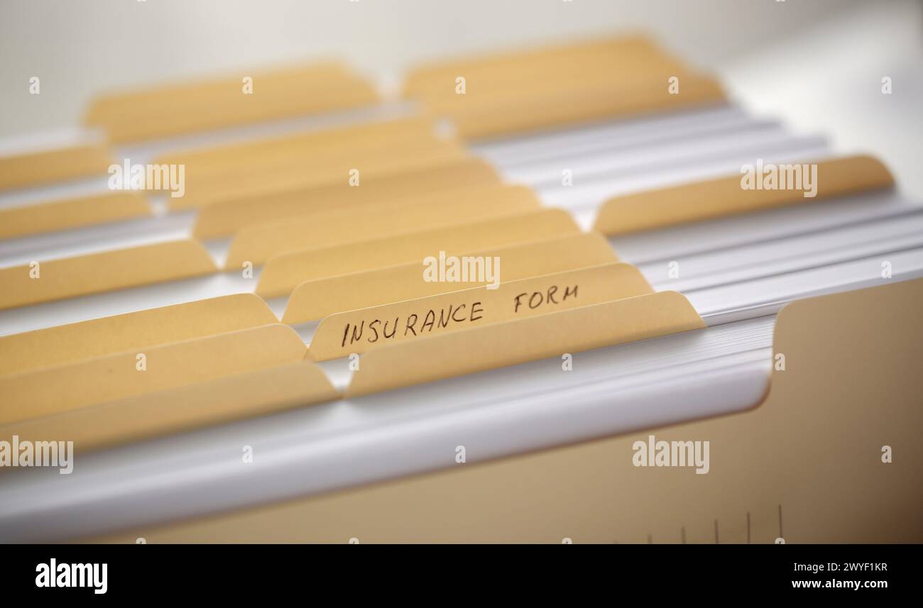 Yellow folders with labels and paper in a row Stock Photo - Alamy