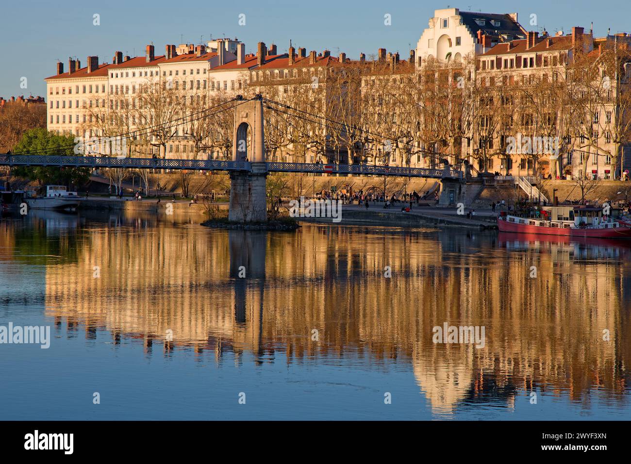 LYON, FRANCE, March 19, 2024 : Reflection of buildings on Rhone river ...