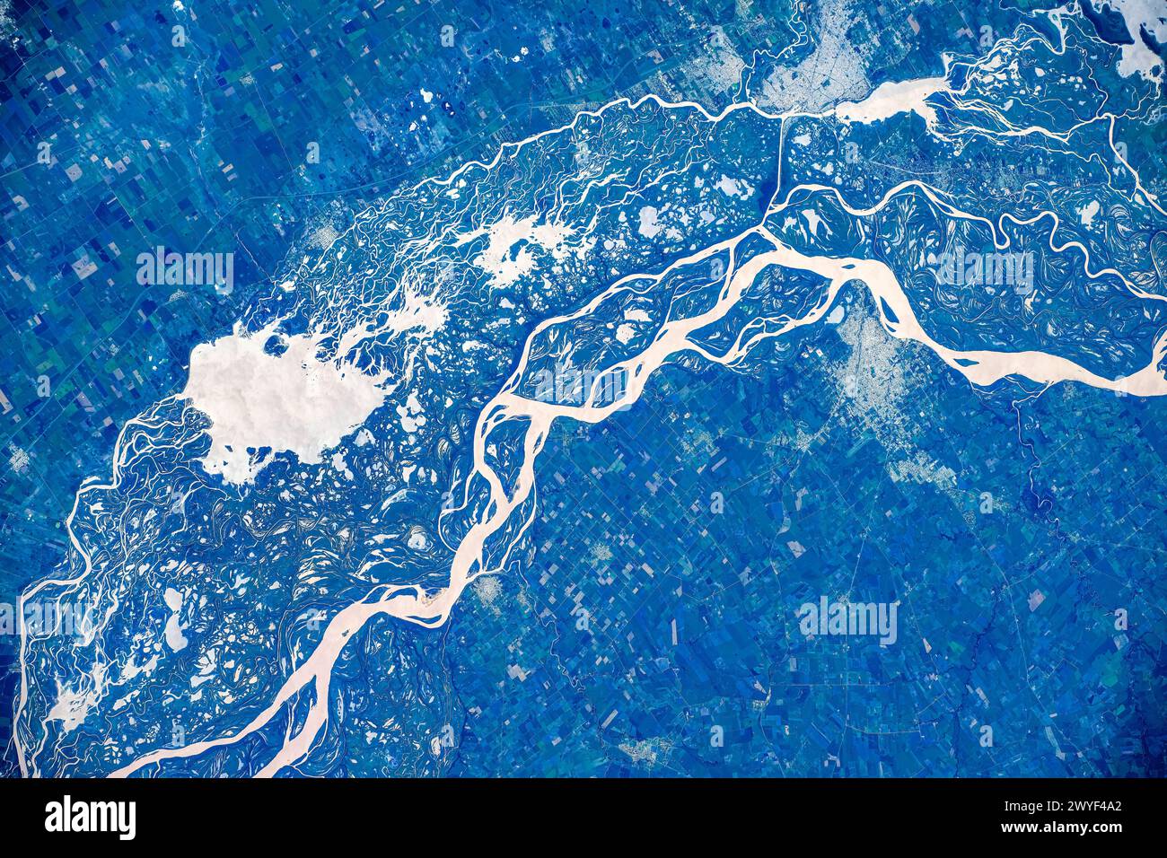 Green-covered land and rivers in the area of Argentina and Uruguay ...
