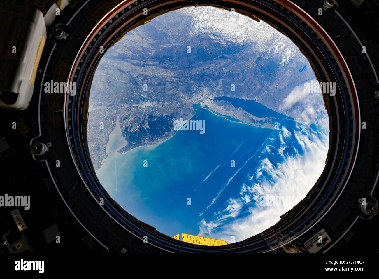 Scenic view of Planet Earth, looking through the window of the ISS ...
