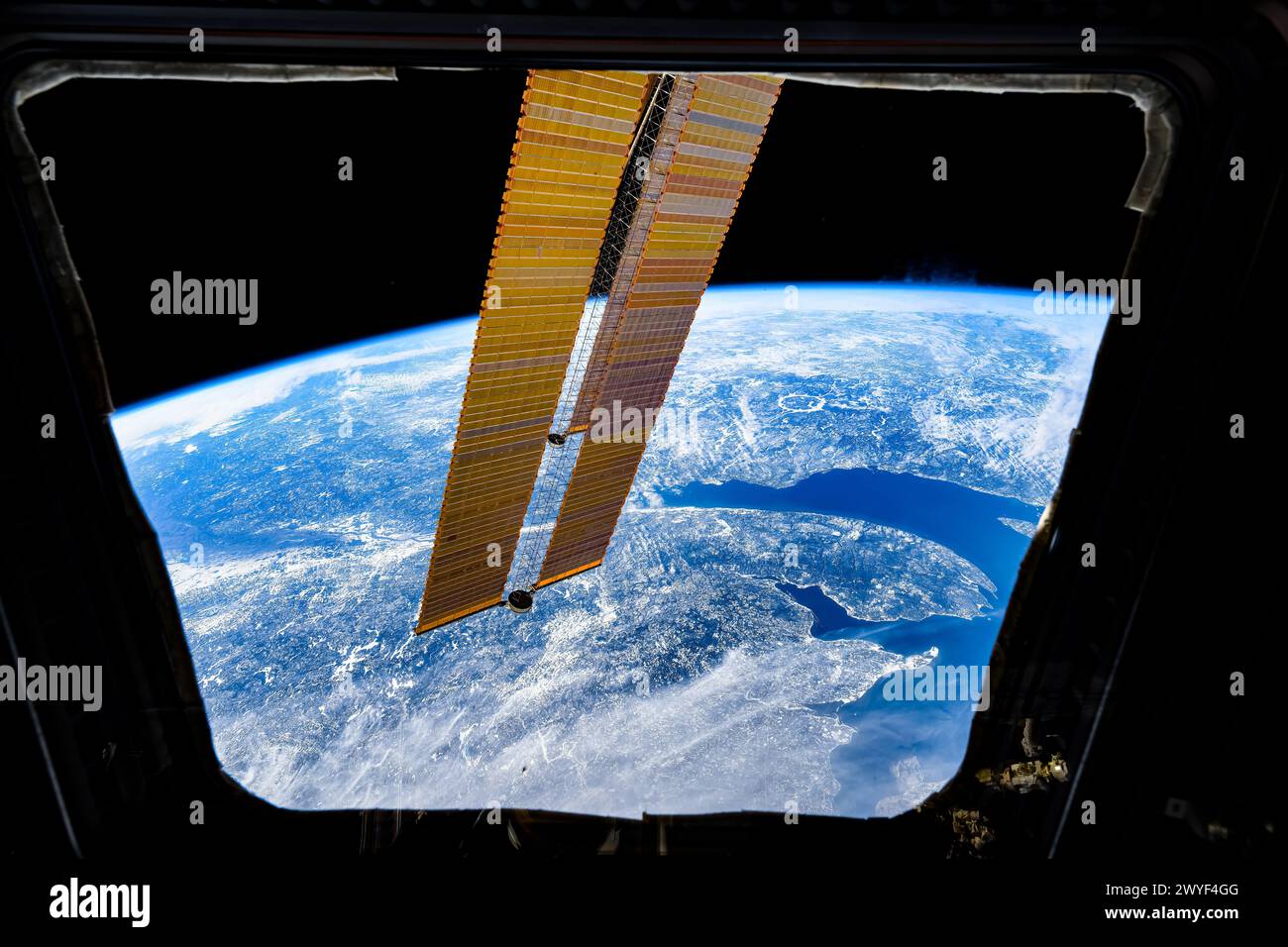 Scenic view of Planet Earth, looking through the window of the ISS. Digital enhancement of an ...