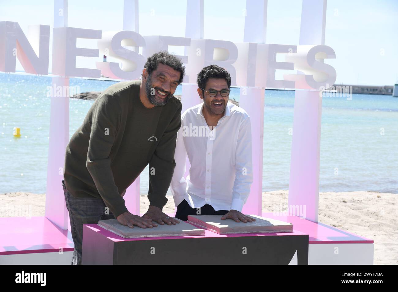 CANNES, FRANCE - APRIL 06: Ramzy Bedia and Jamel Debbouze sign their ...