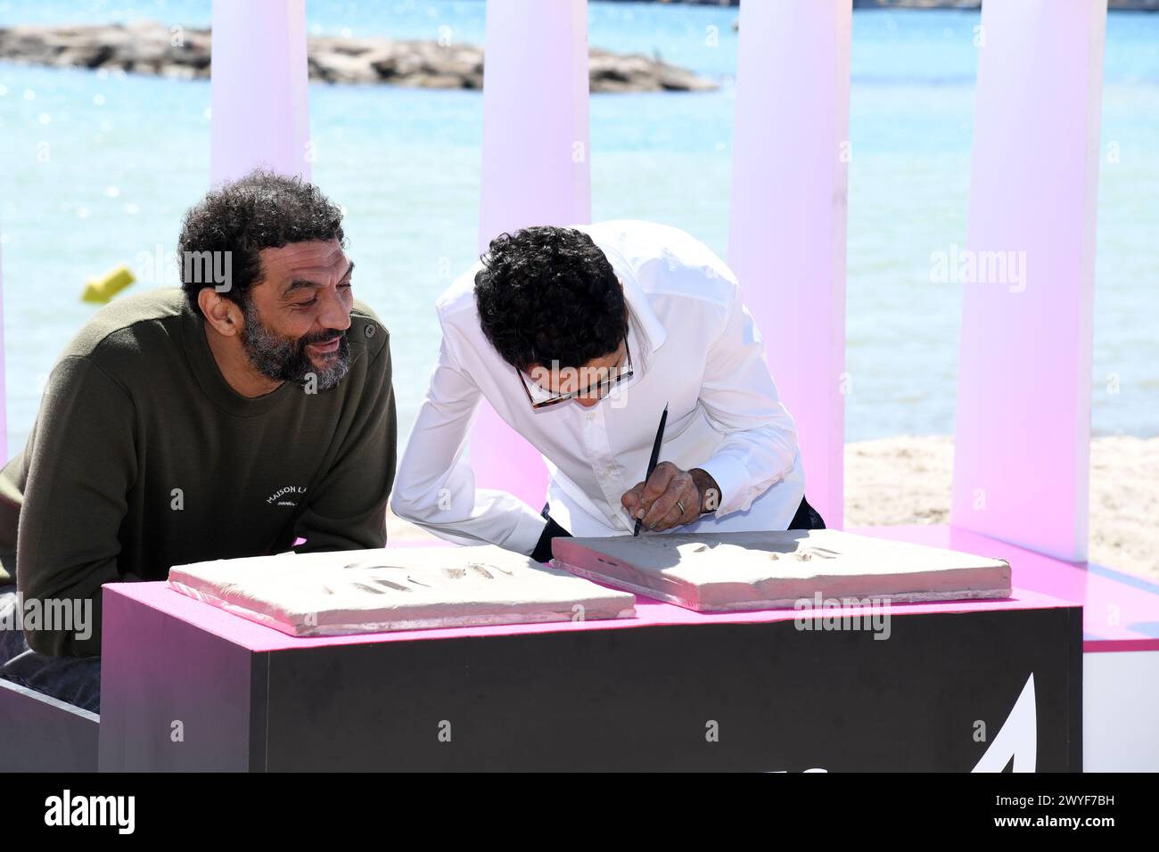 CANNES, FRANCE - APRIL 06: Ramzy Bedia and Jamel Debbouze sign their ...