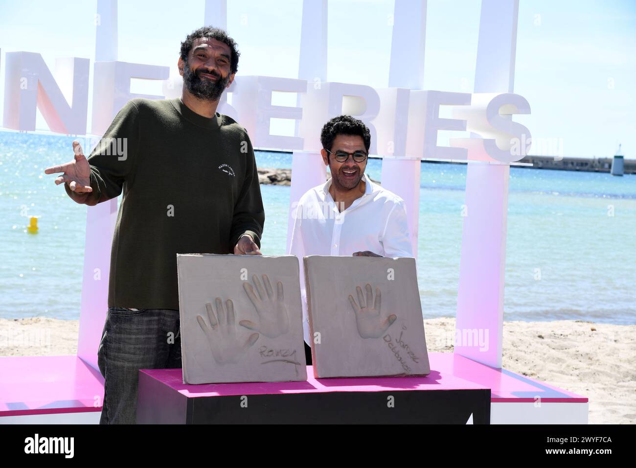 CANNES, FRANCE - APRIL 06: Ramzy Bedia and Jamel Debbouze sign their ...