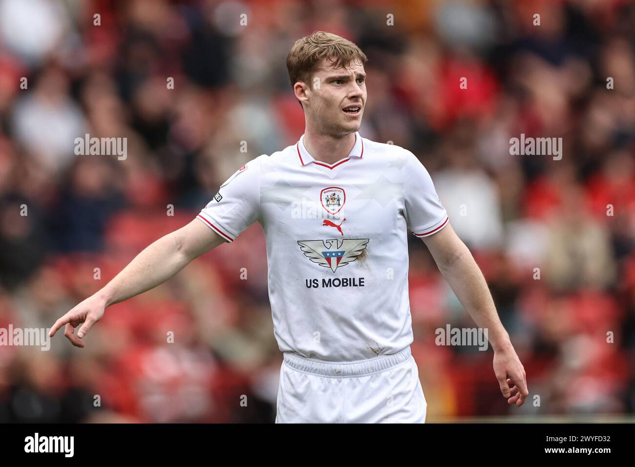Luca Connell of Barnsley gives his team instructions during the Sky Bet ...