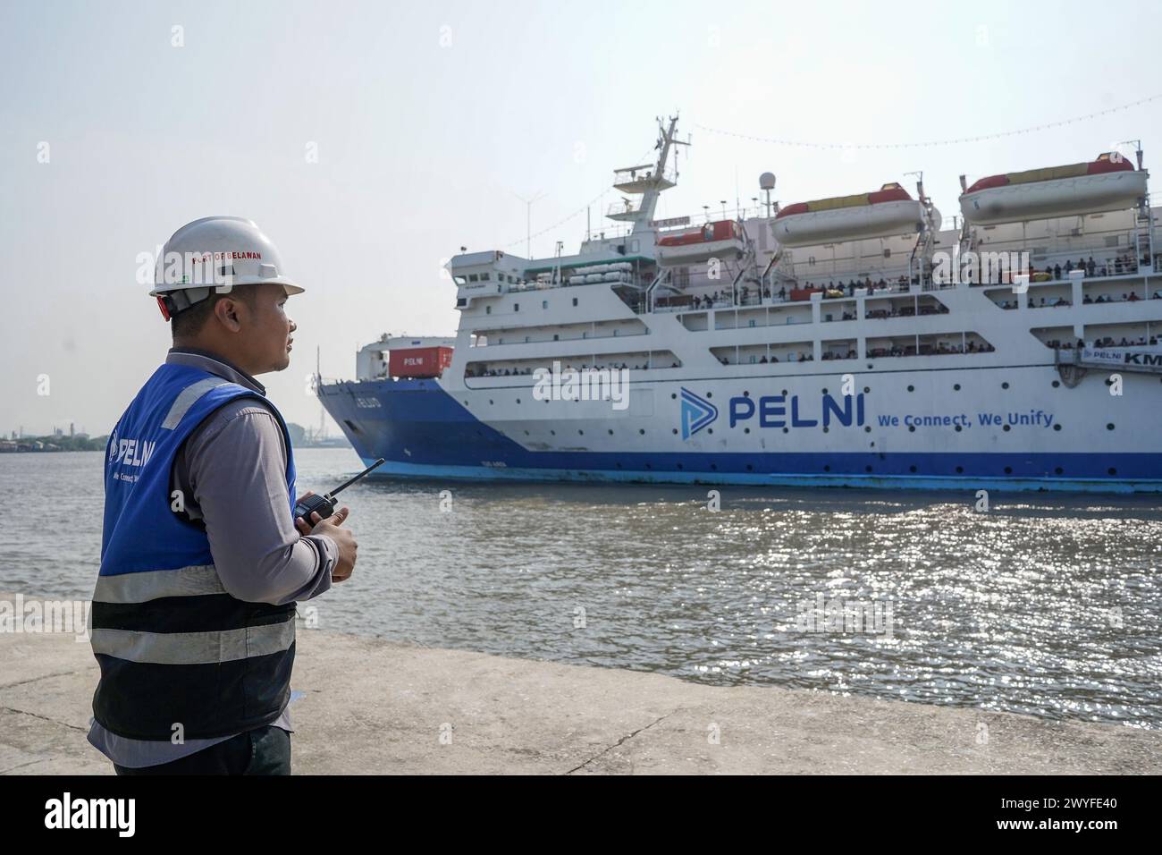 Medan, North Sumatra, Indonesia. 6th Apr, 2024. An officer coordinates ...