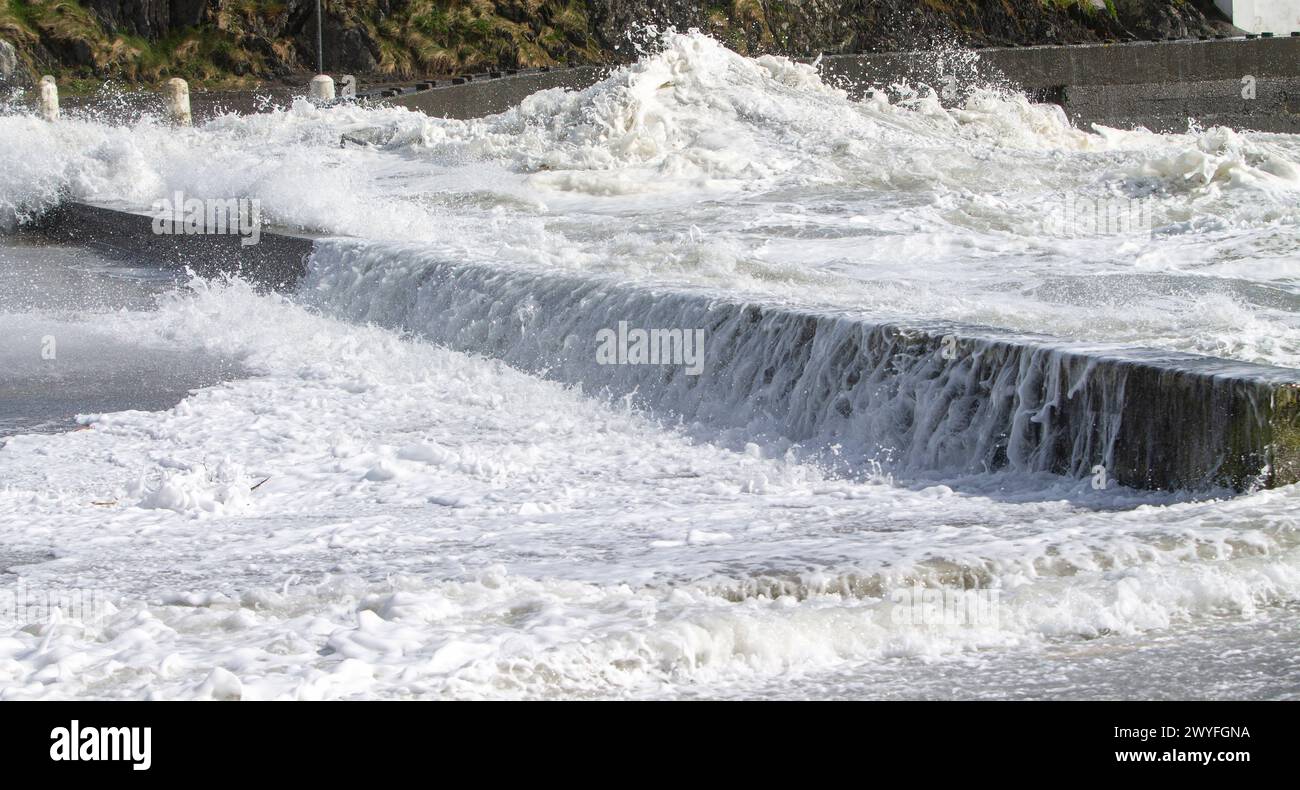 Waves overtopping sea wall hi-res stock photography and images - Alamy