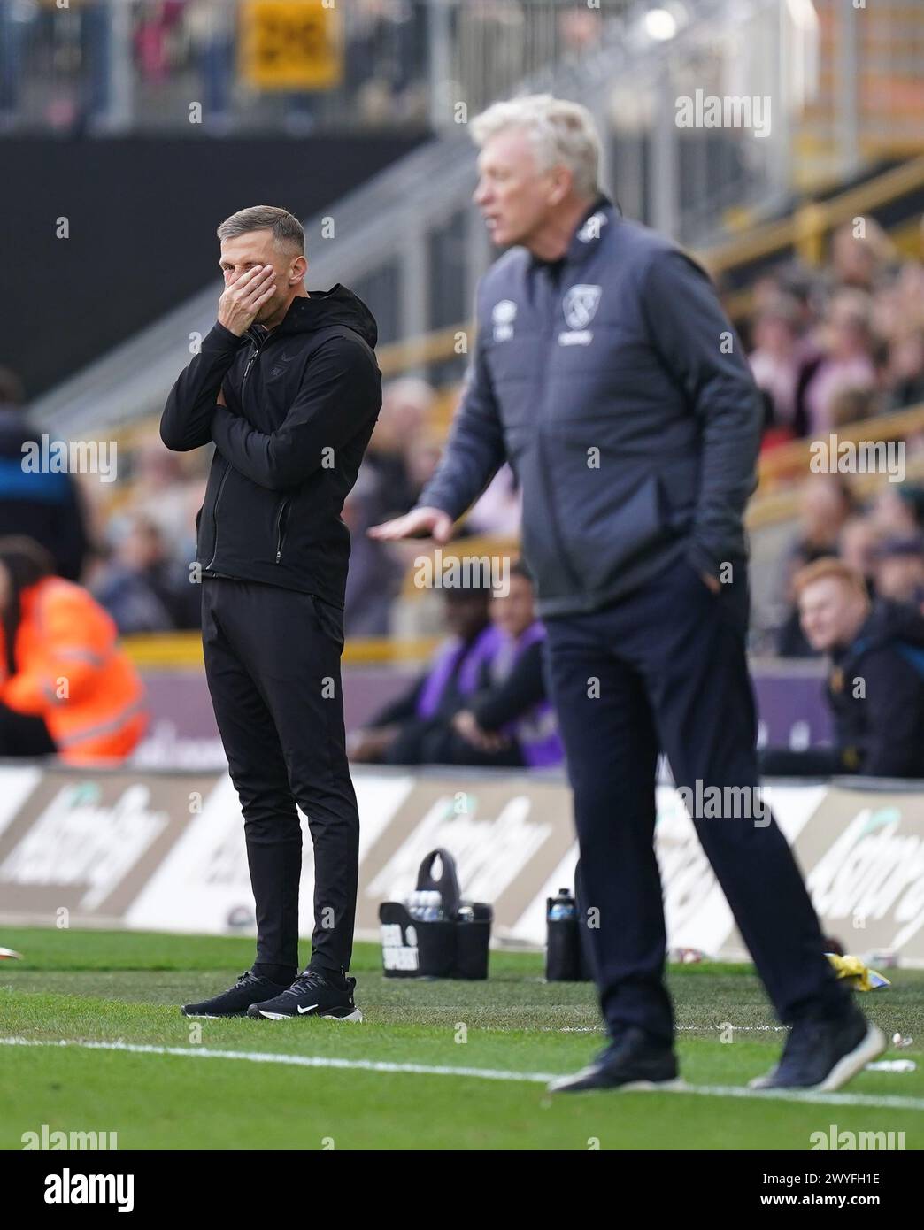 Wolverhampton Wanderers manager Gary O'Neil (left) and West Ham United ...