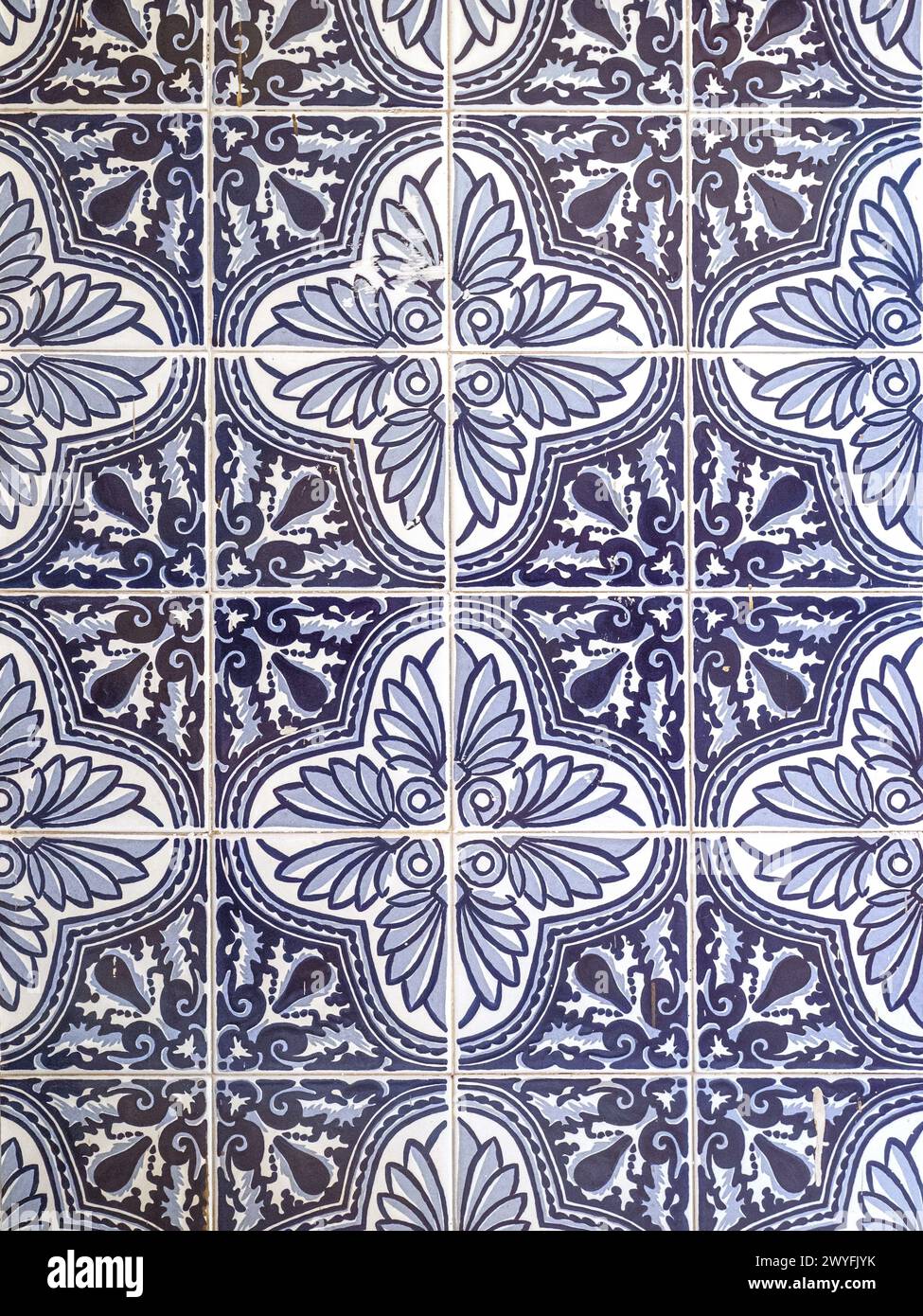 A pattern made of traditional blue floral Spanish tiles on a wall Stock ...