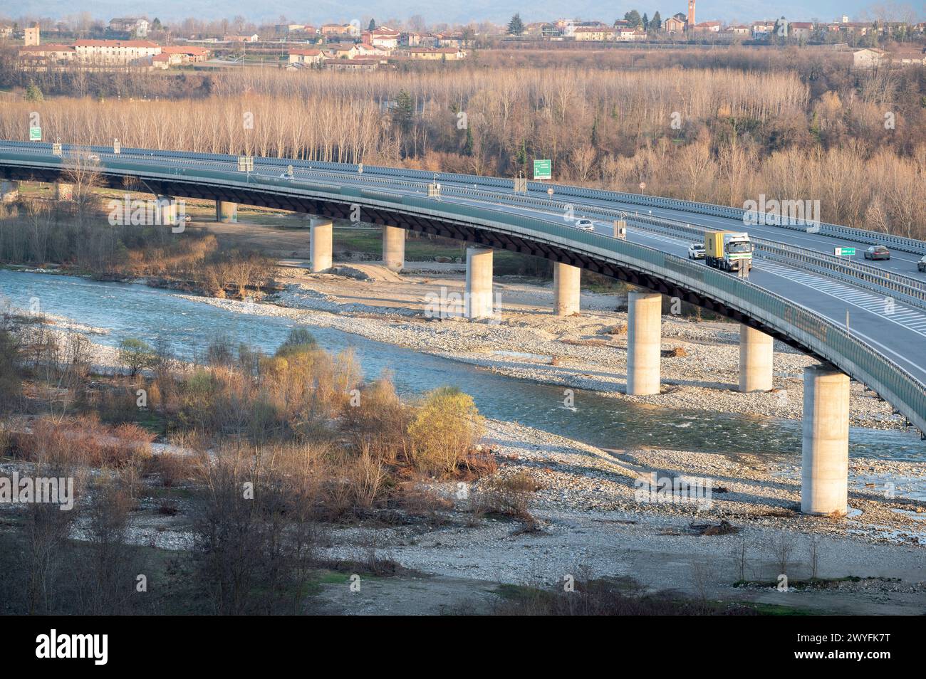 Highway viaduct crossing a river in northern Italy Stock Photo - Alamy