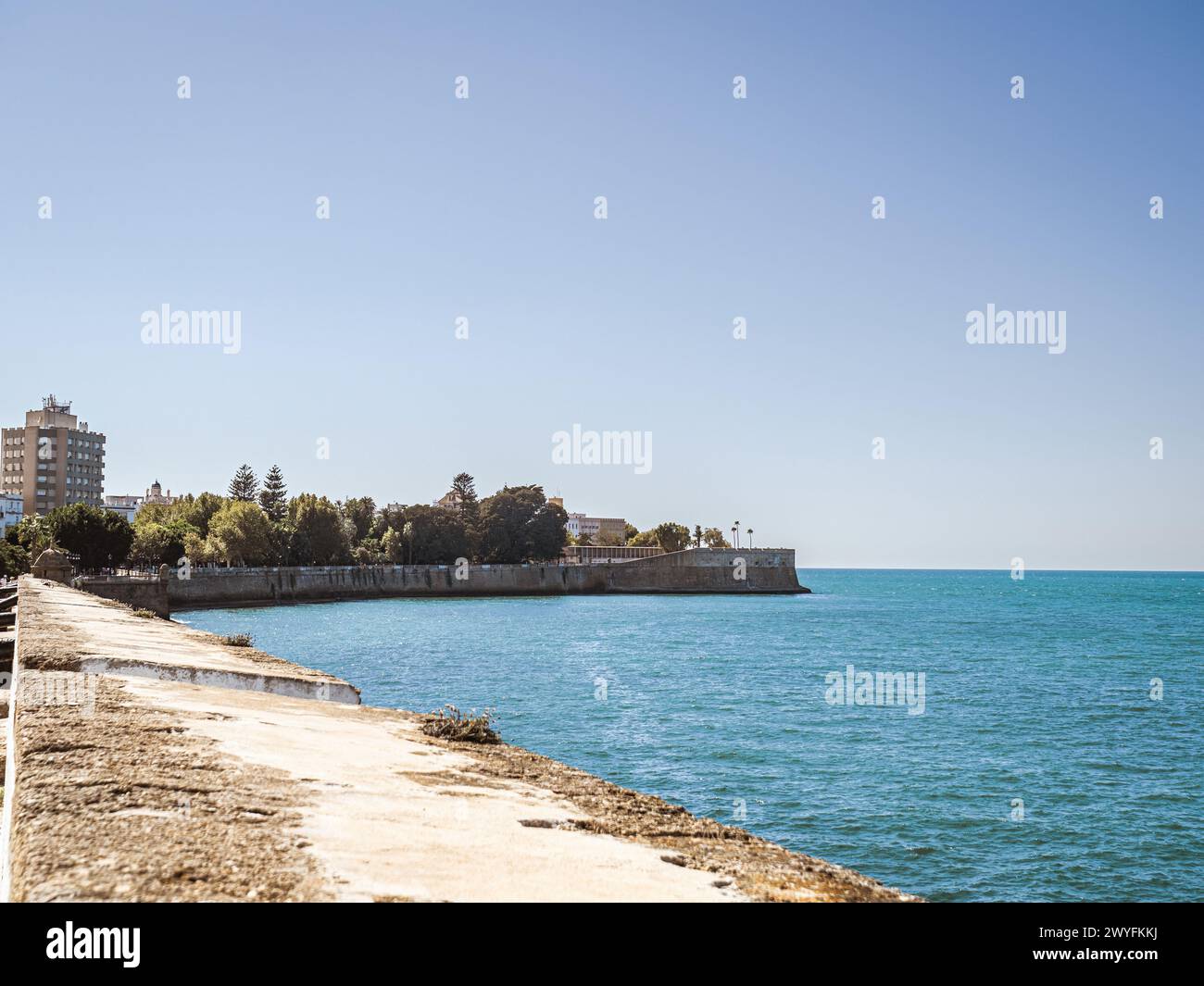 City walls with the bastion Baluarte de la Candelaria and the park of ...