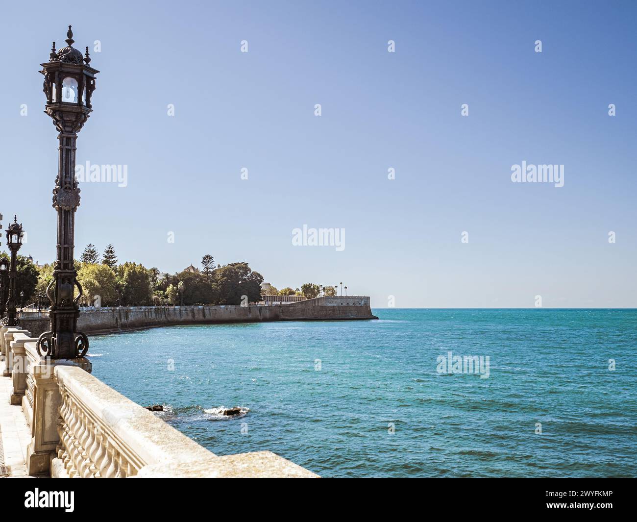 City walls with the bastion Baluarte de la Candelaria and the park of ...