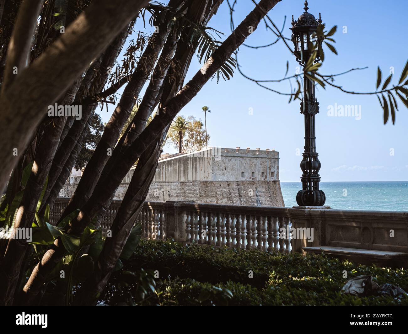 City walls with the bastion Baluarte de la Candelaria and the park of ...