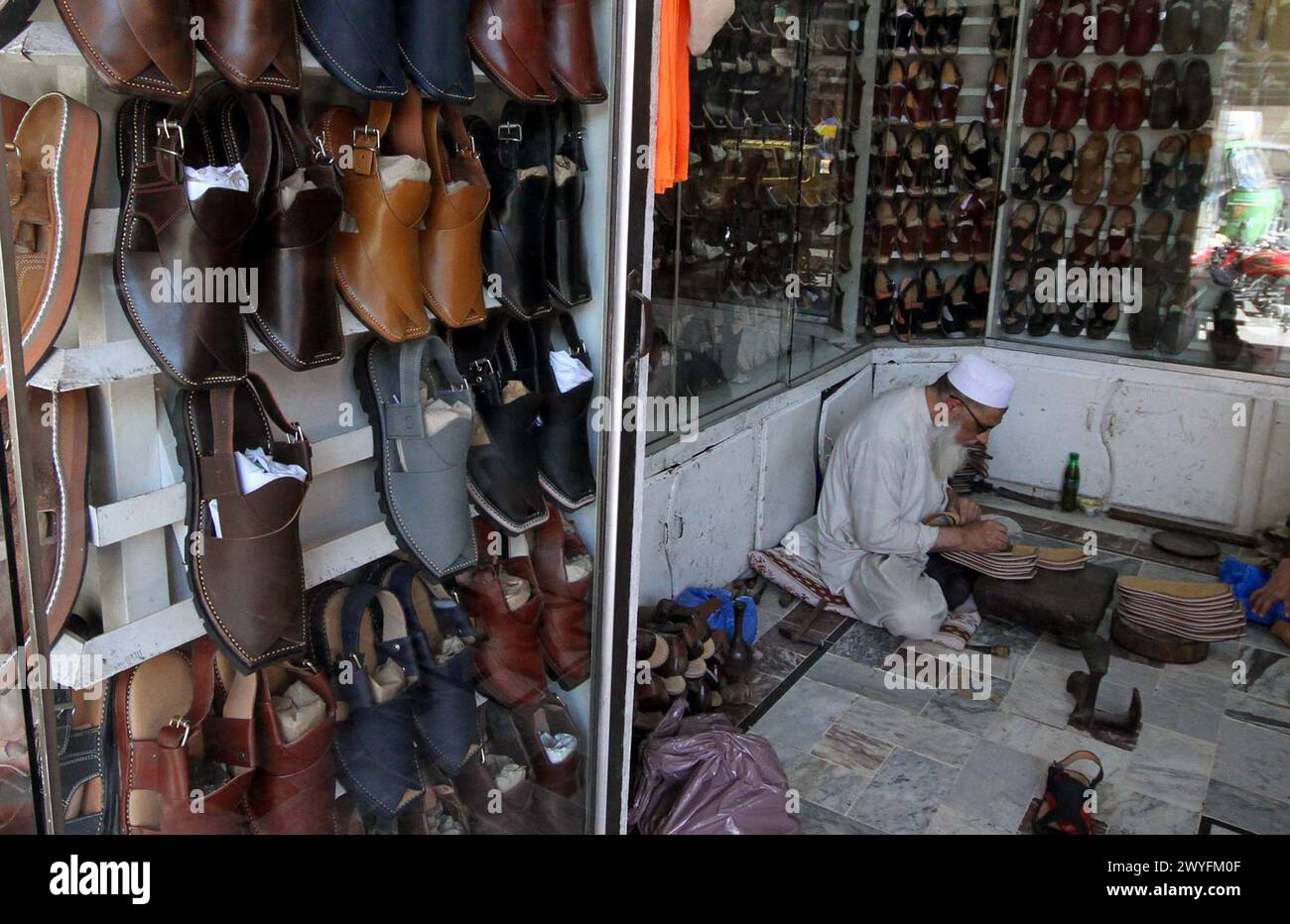 Shoemakers preparing shoes for customers to wear on Eid- ul- Fitar at ...