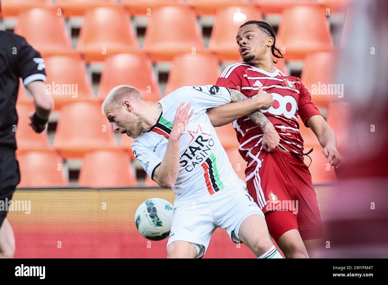 Liege, Belgium. 06th Apr, 2024. OHL's Jon Thorsteinsson and Standard's ...
