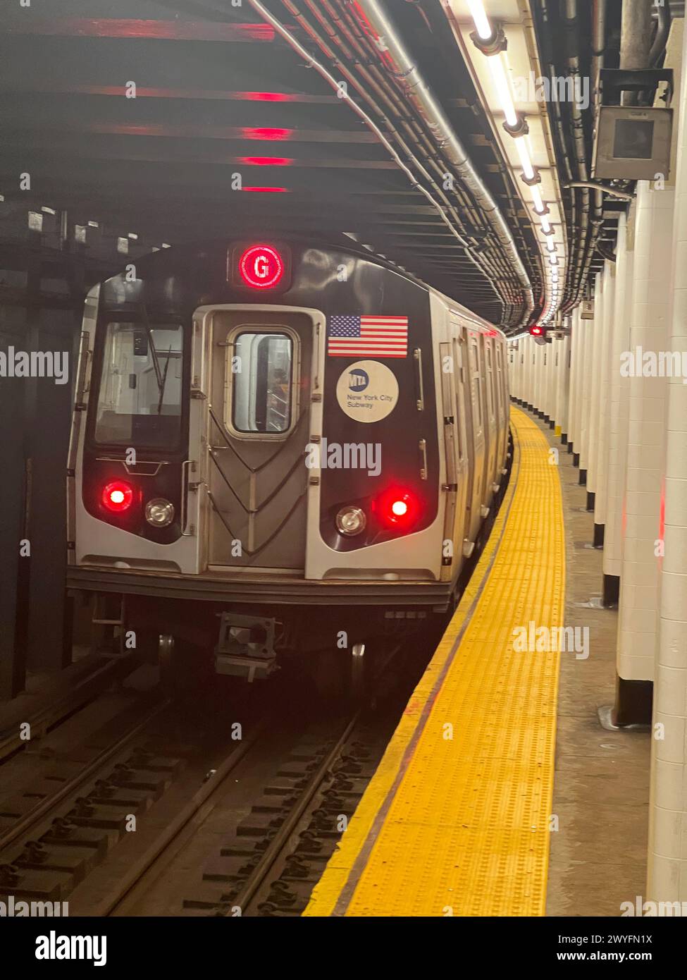Train entering a station hi-res stock photography and images - Alamy