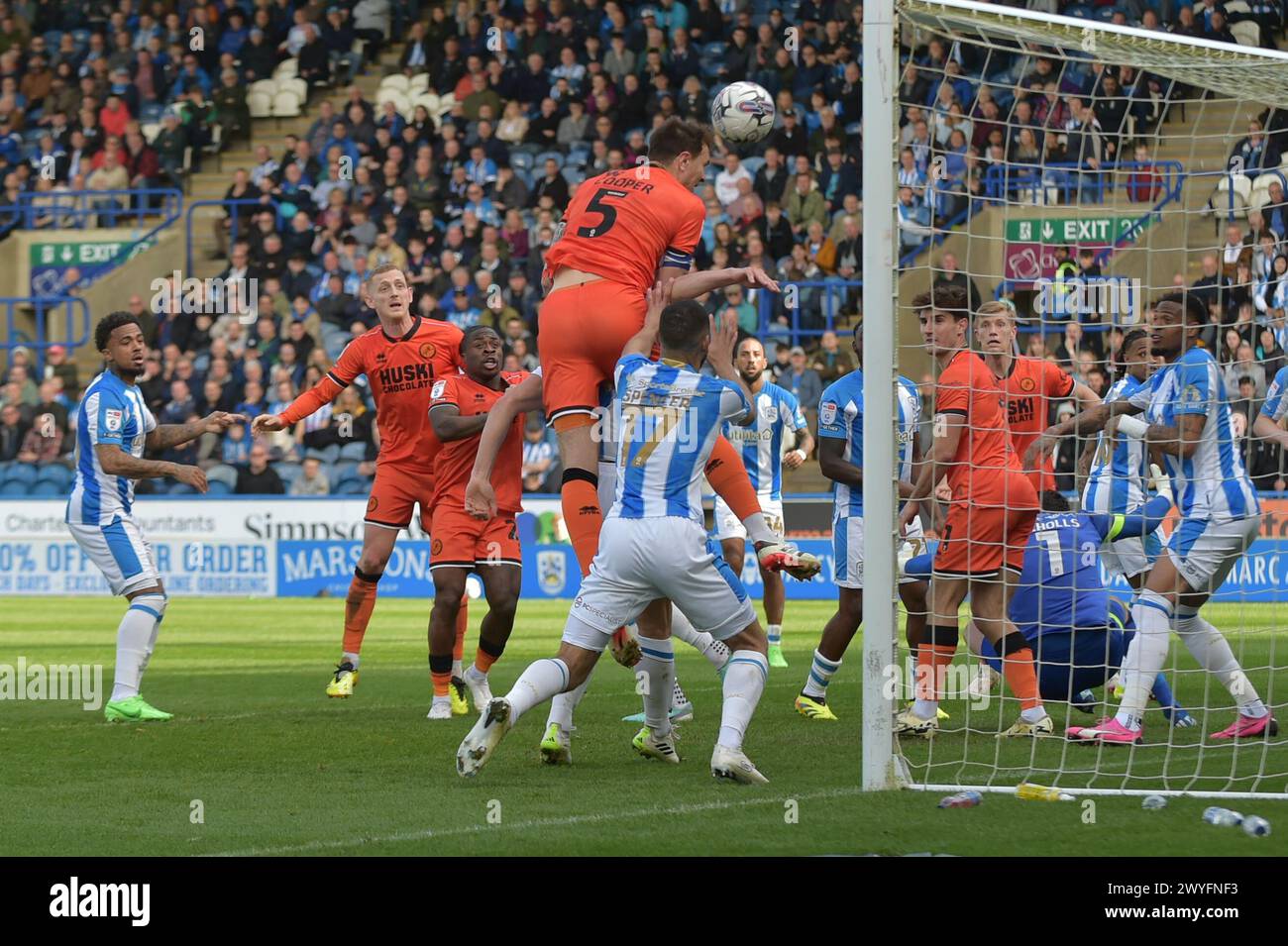 Jake Cooper of Millwall heads the ball over the cross bar during the ...