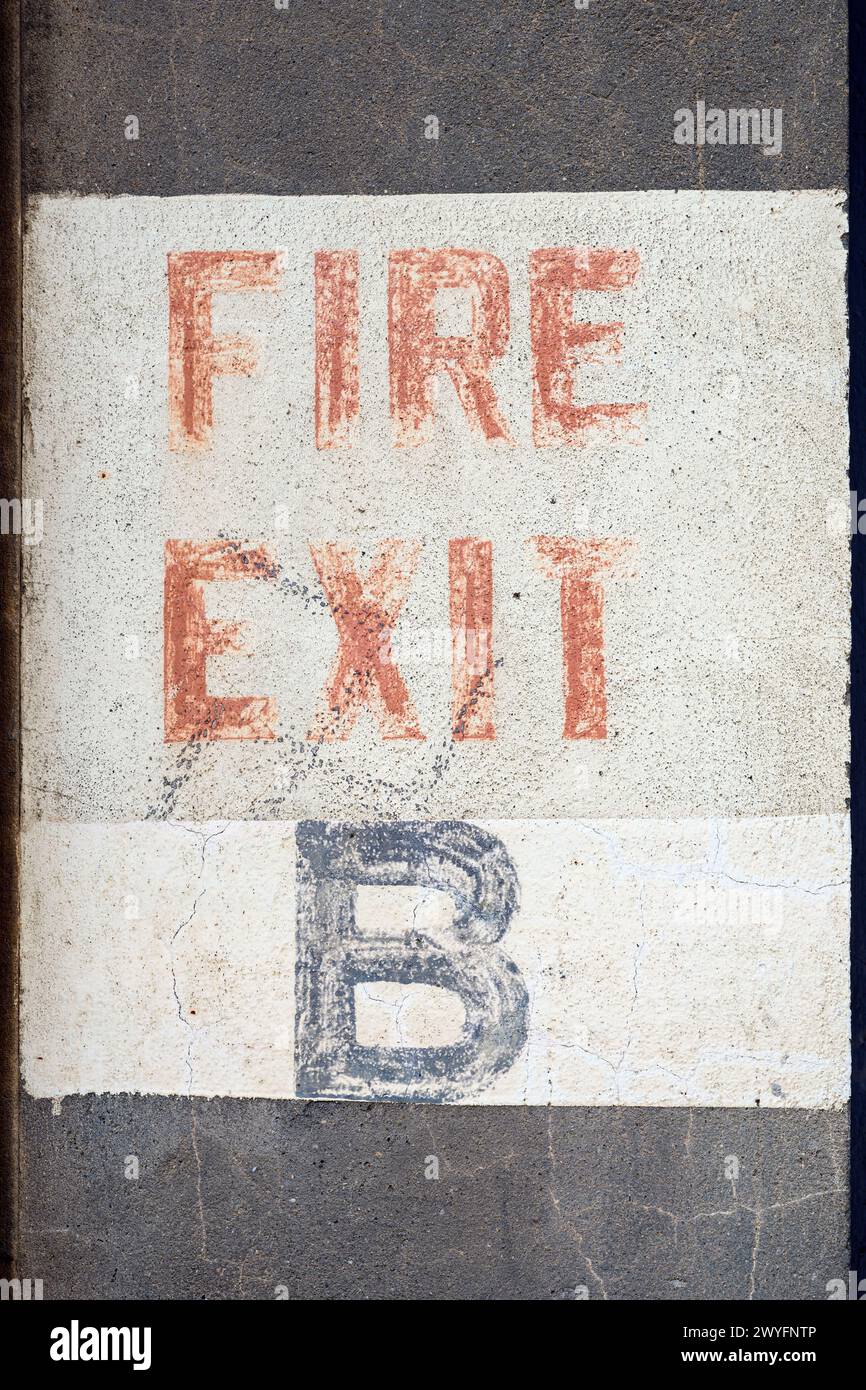 An old faded Fire Exit B sign Stock Photo - Alamy