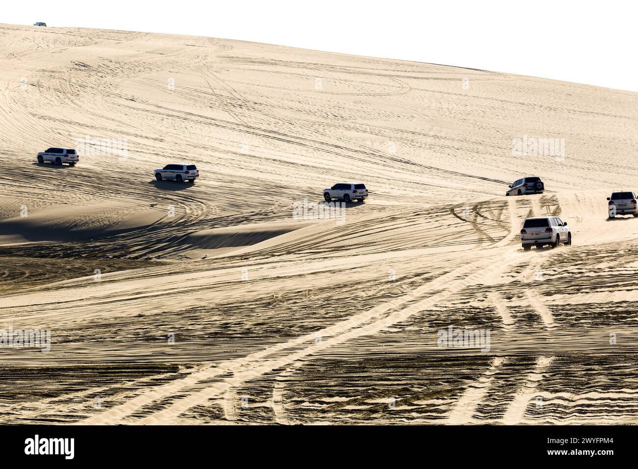 Desert safari in desert off Doha, Group of tourists make a safari with ...