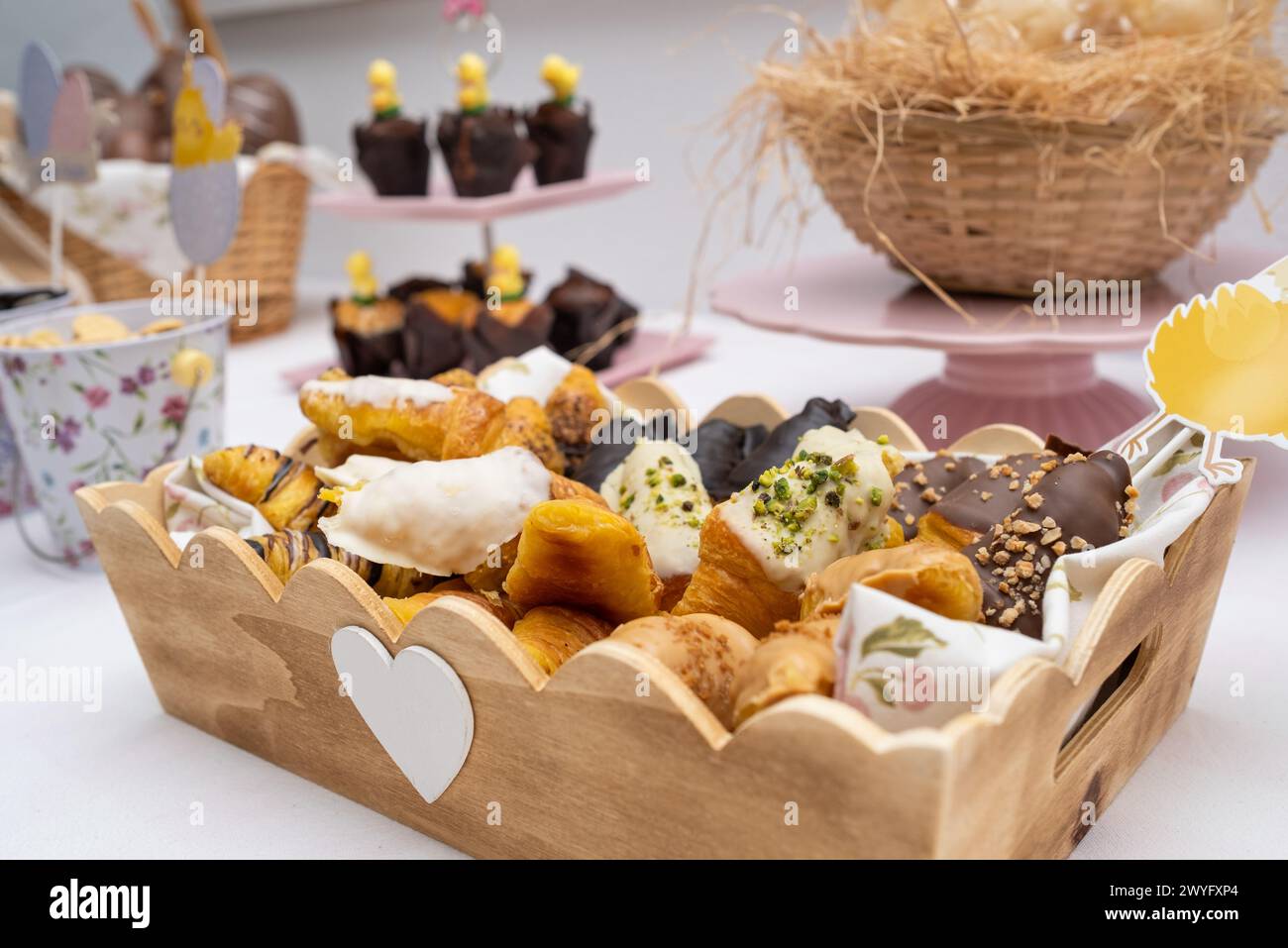 Detail of a tray with Easter croissants on an Easter candy table ...