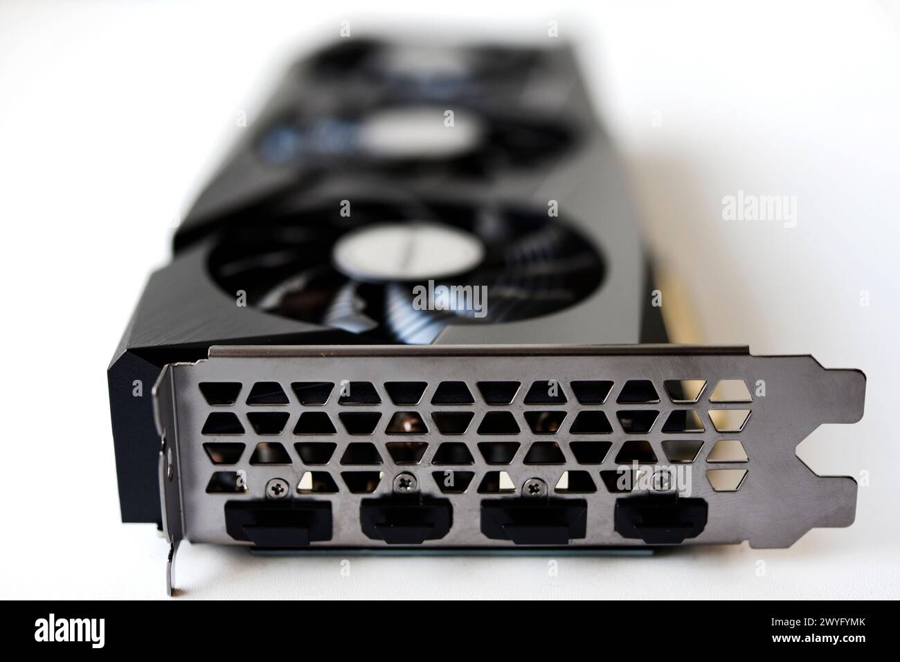 A black and white video card on a white background. Fans and the ...