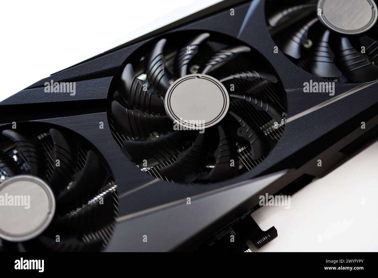 A black and white video card on a white background. Fans and the ...