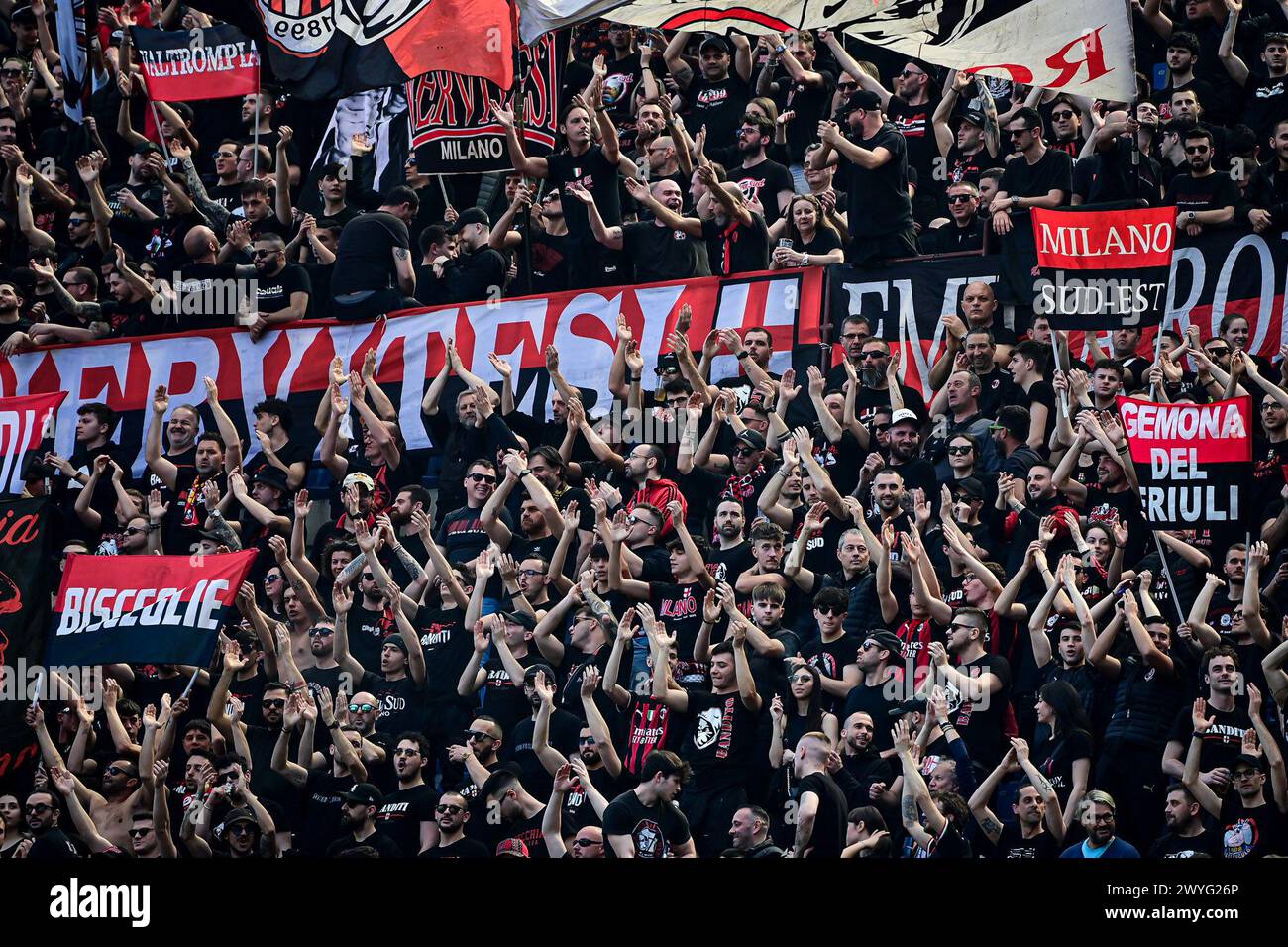 AC Milan supporters cheer their team during the Italian Serie A fooball ...