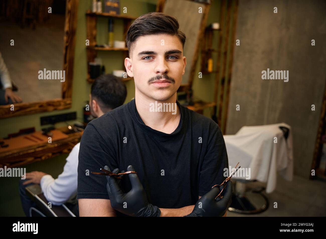 Man holding barber scissors hi-res stock photography and images - Alamy