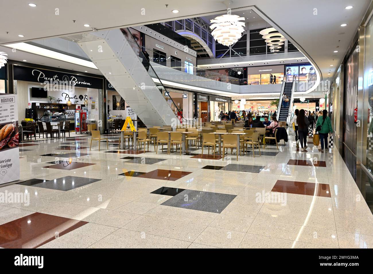 Inside central hub of very busy large Nevada Shopping mall one of many eating area, restaurants ...