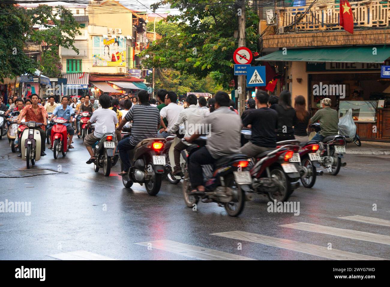 Busy traffic at a street junction in Hanoi in northern Vietnam in South ...