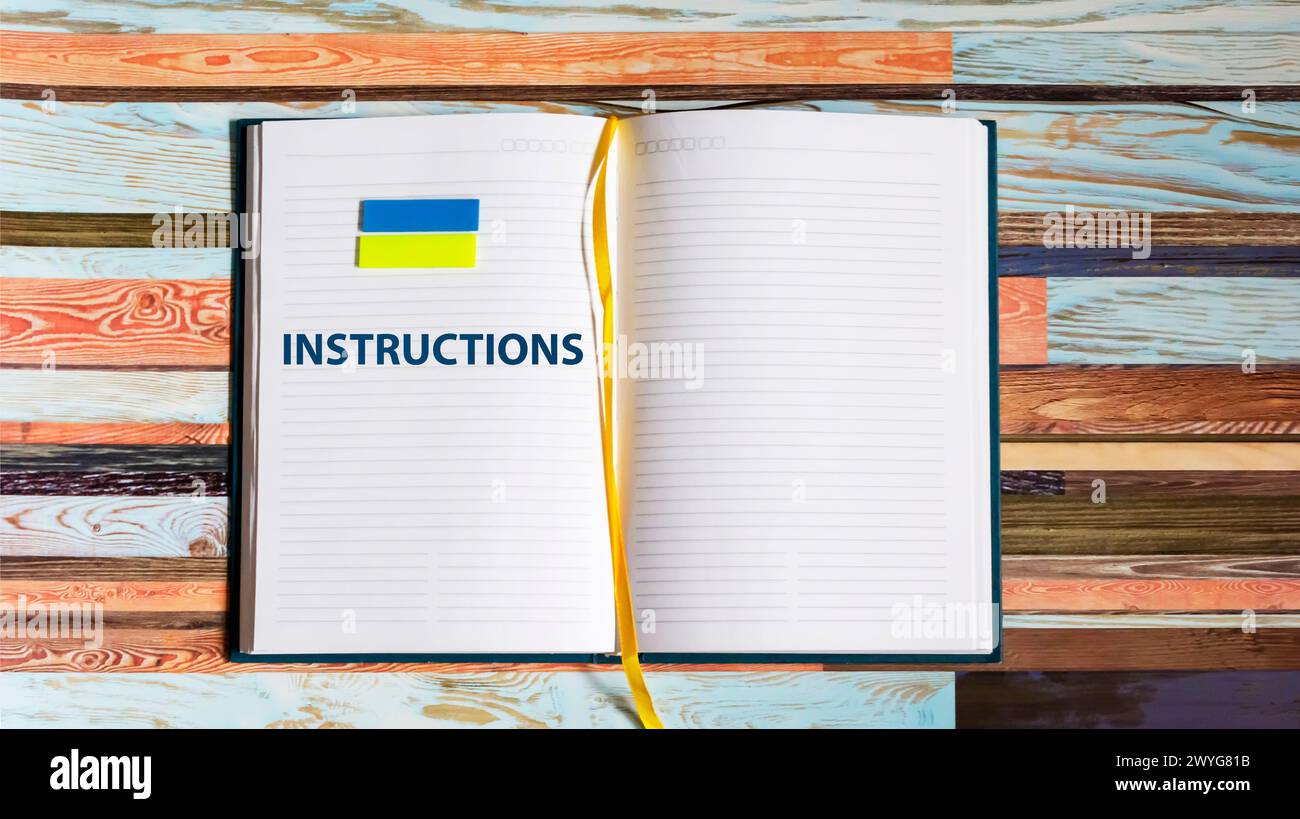 Notepad with the word INSTRUCTIONS on a vintage background. concept of ...