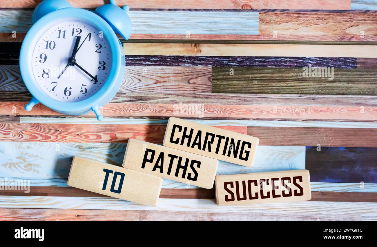 Charting paths to success quotes on wooden blocks and vintage ...