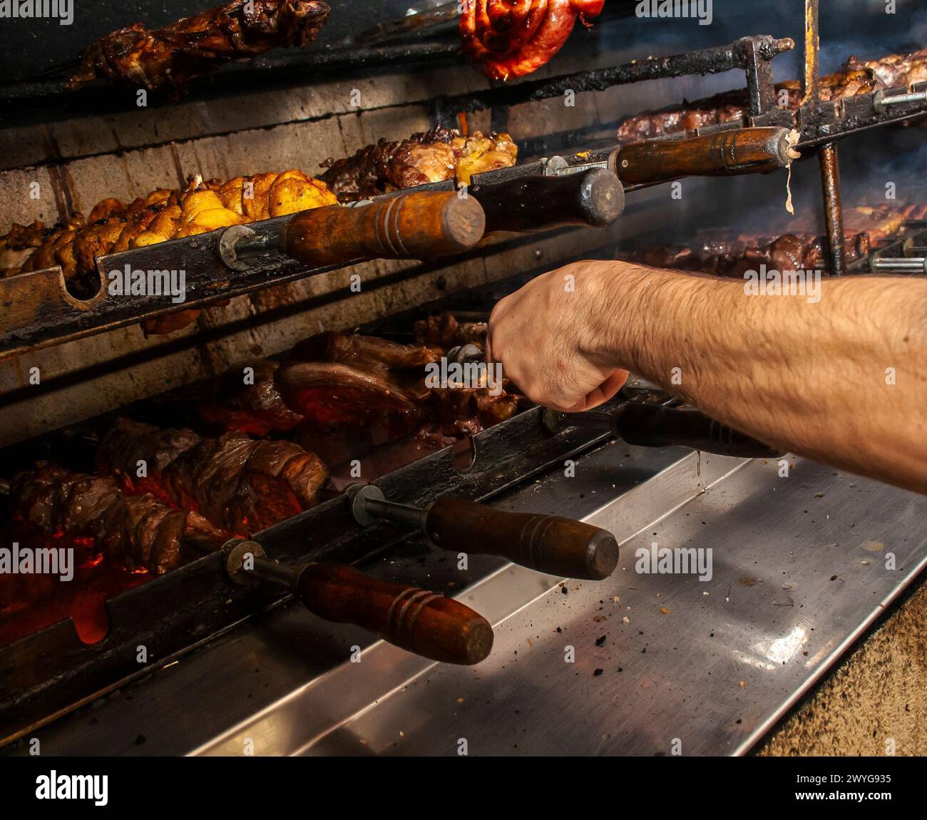 Brazilian style beef ribs Barbecue grill on skewers at a churrascaria ...