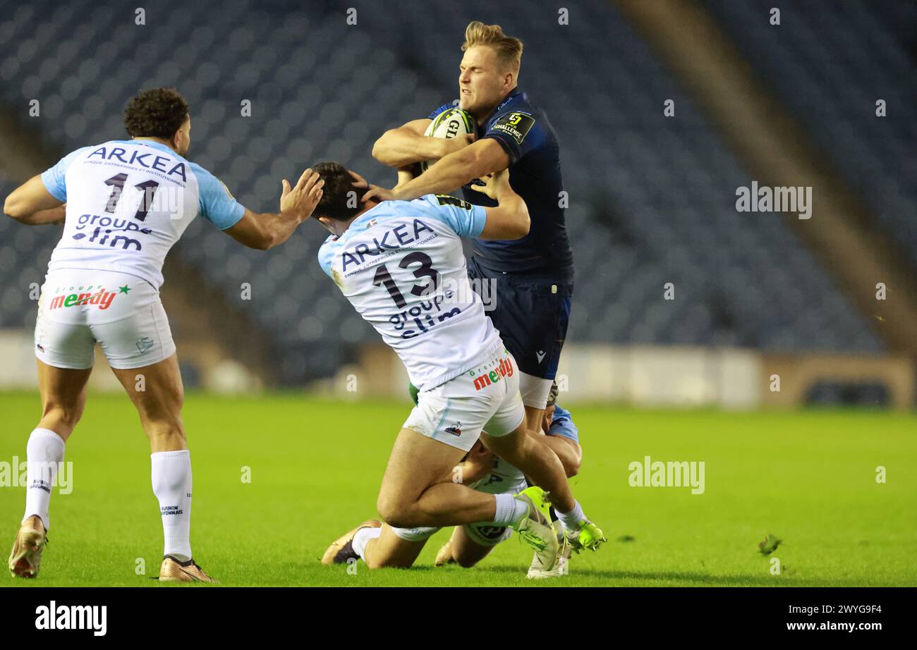 Edinburgh’s Duhan Van Der Merwe (right) is tackled by Bayonne's ...
