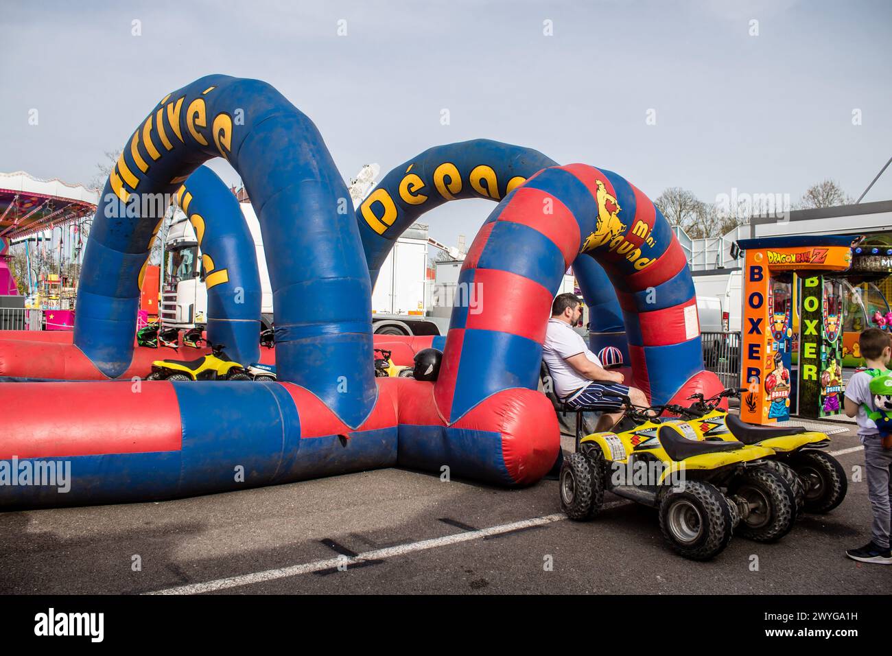 Reims France April 6, 2024 Funfair with its colorful stands located in ...