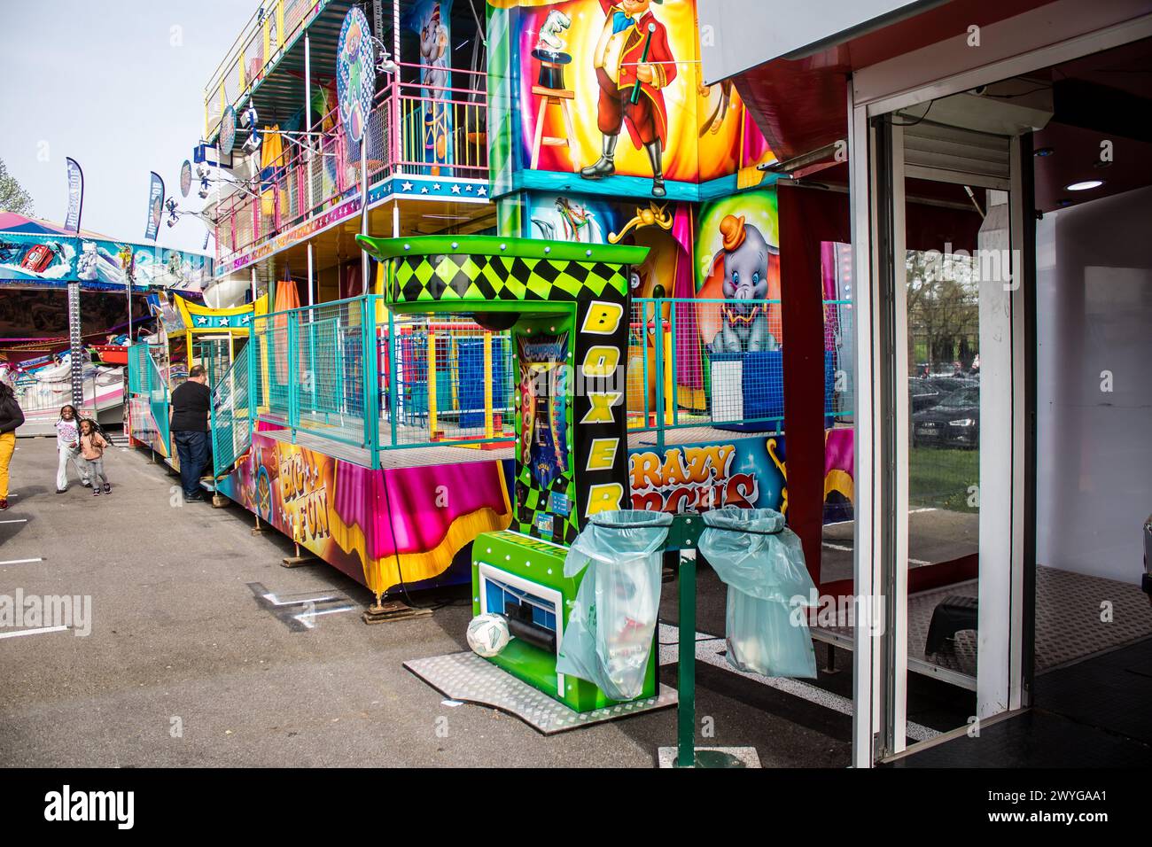 Reims France April 6, 2024 Funfair with its colorful stands located in ...