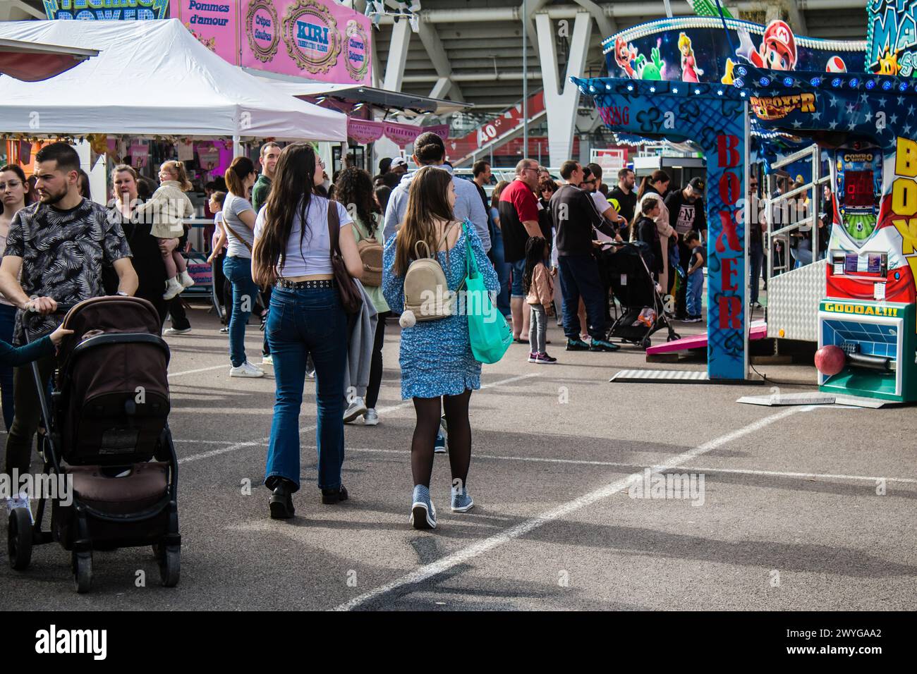 Reims France April 6, 2024 Funfair with its colorful stands located in ...
