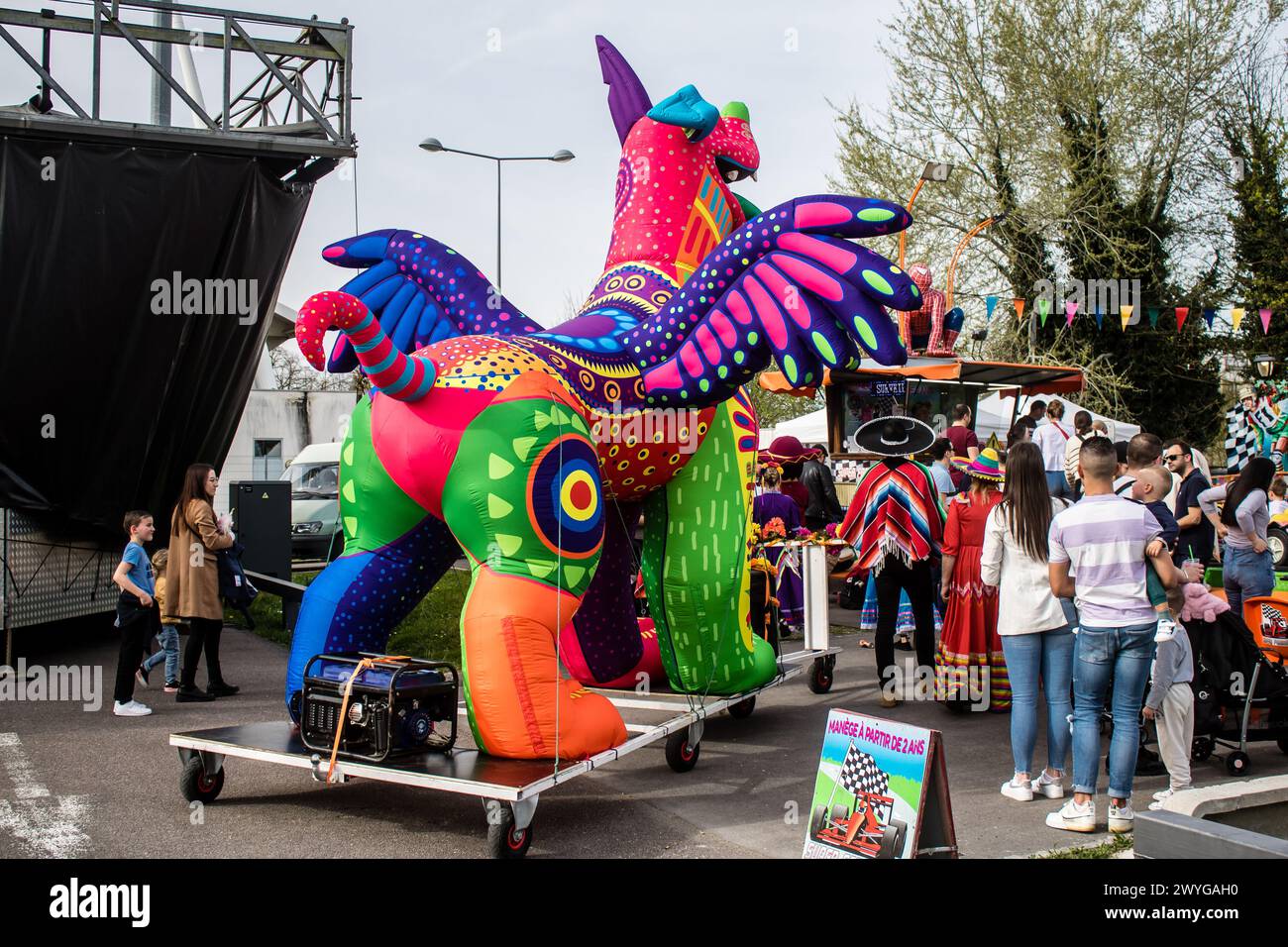 Reims France April 6, 2024 Funfair with its colorful stands located in ...