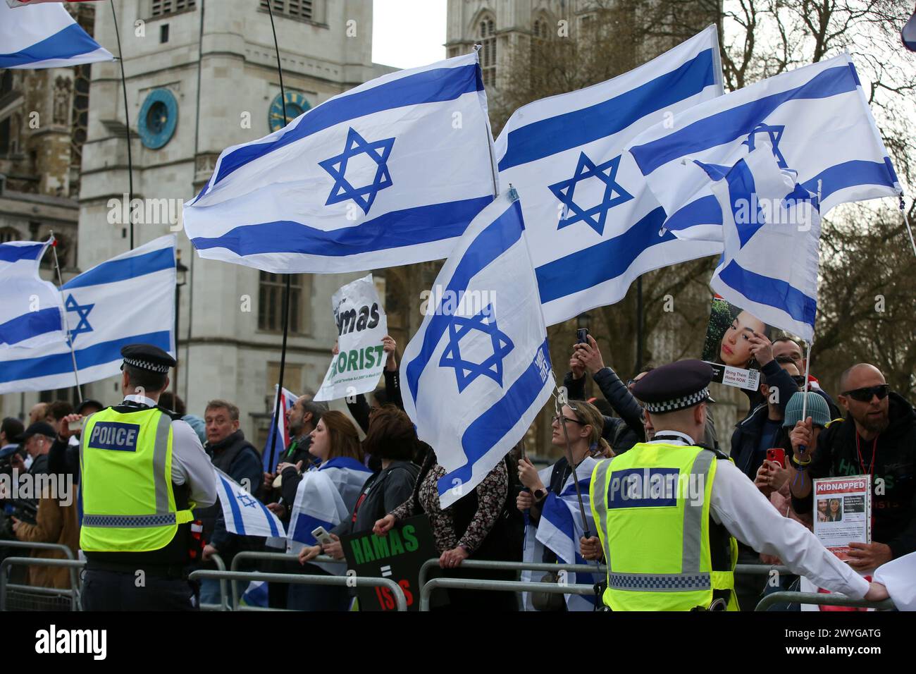 Counter-protesters wave Israeli flags during the Al Quds Day protest ...