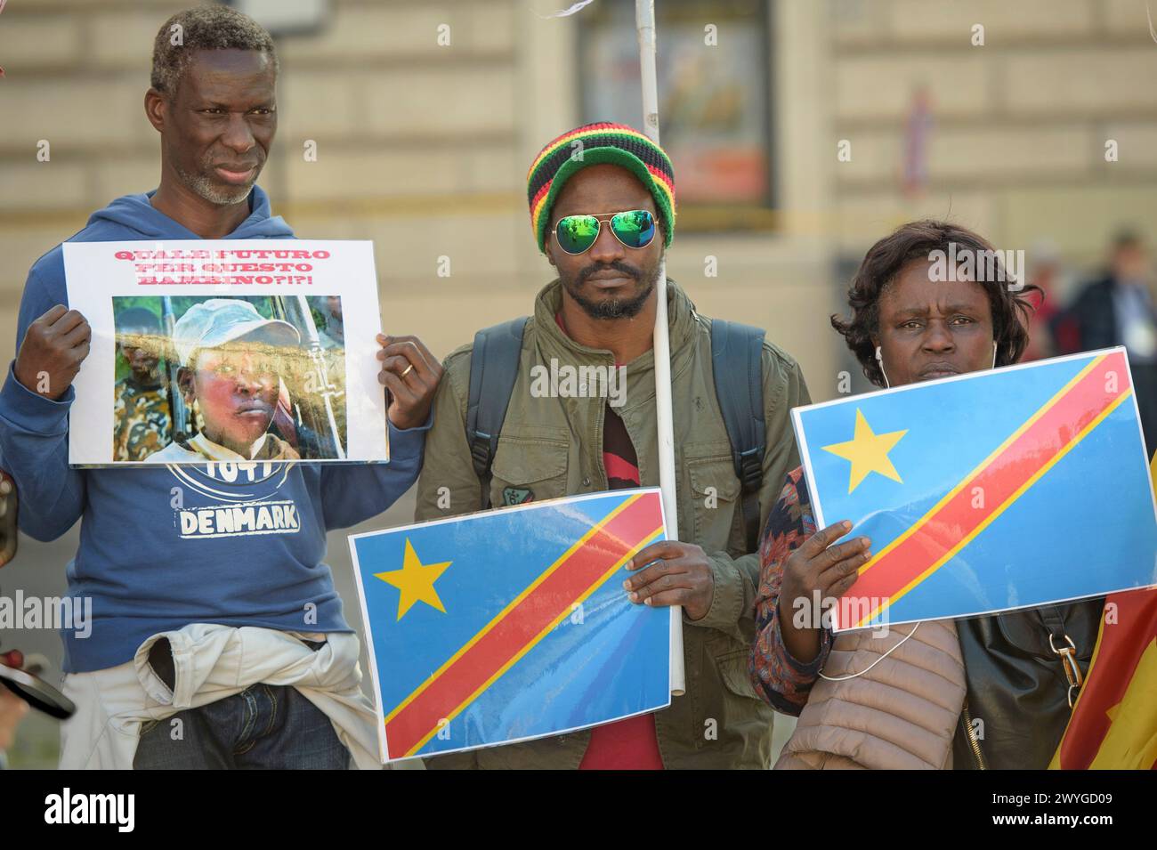April 6, 2024, Rome, Italy: A man shows a photo of a child soldier with ...