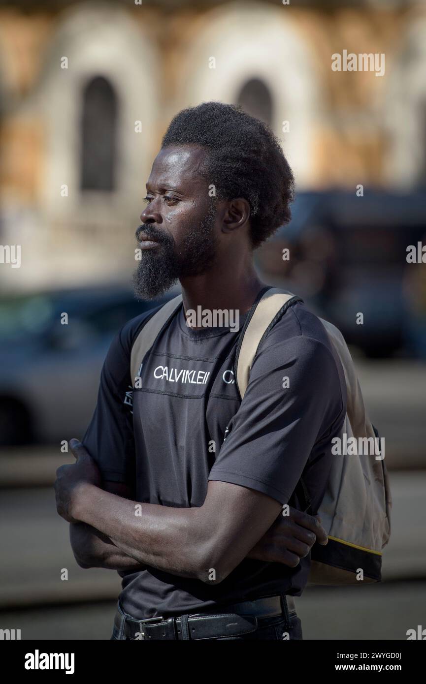 April 6, 2024, Rome, Italy: A man of African origin attends the ...