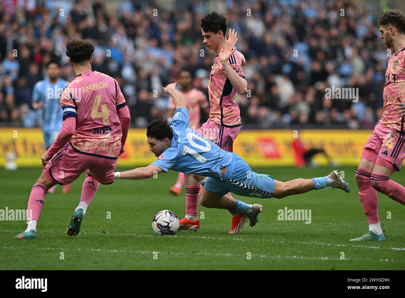 Callum OHare (10 Coventry City) challenged by Archie Gray (22 Leeds ...