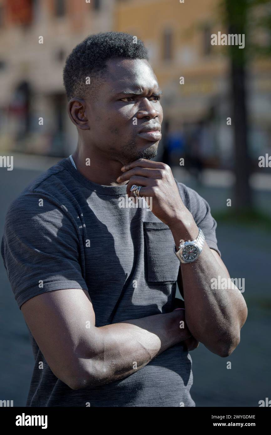 April 6, 2024, Rome, Italy: A man of African origin attends the ...