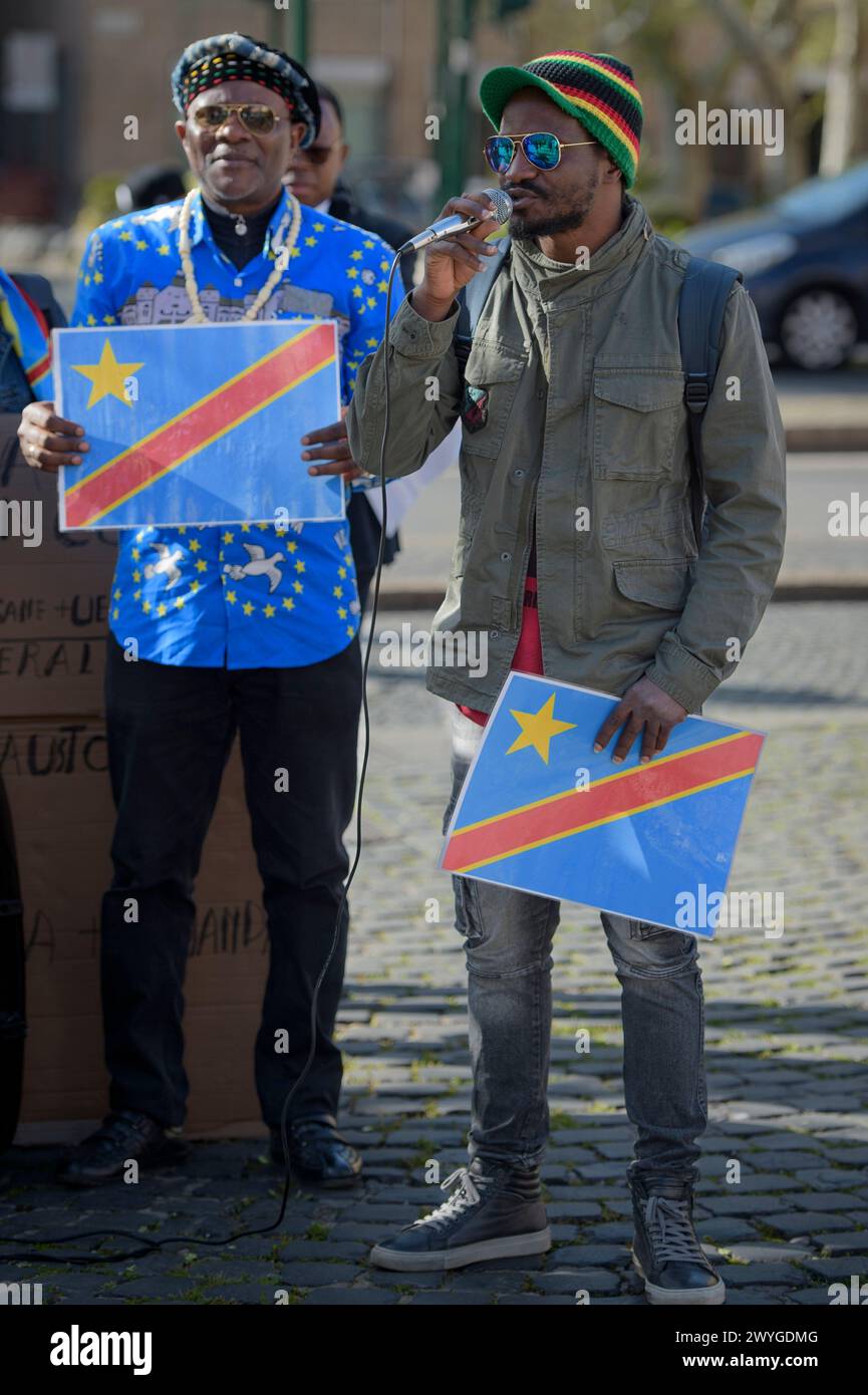 April 6, 2024, Rome, Italy: Two men show the flags of Congo during the demonstration to express ...